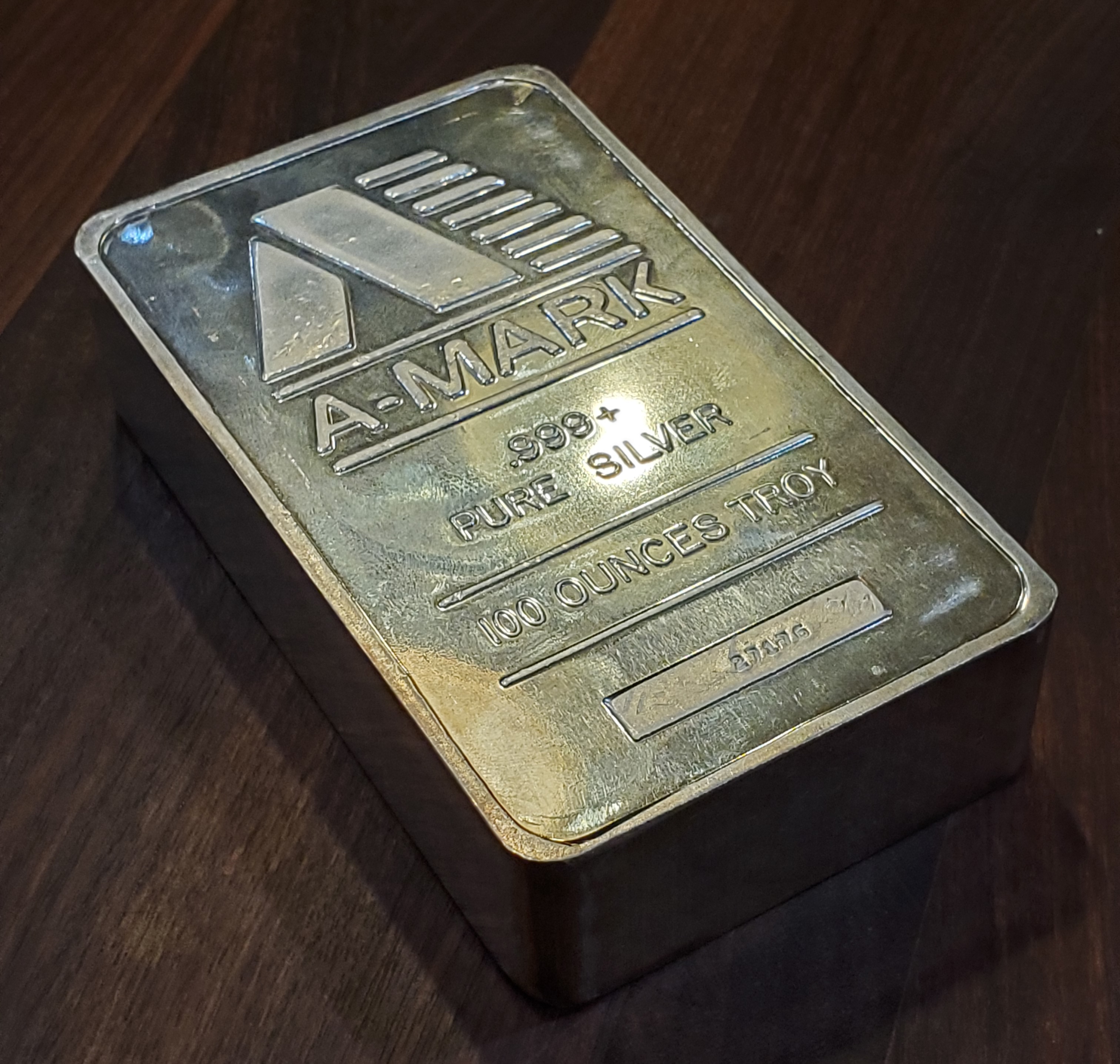 100 oz Silver Bar - A-Mark (Pressed) | PeerMetals